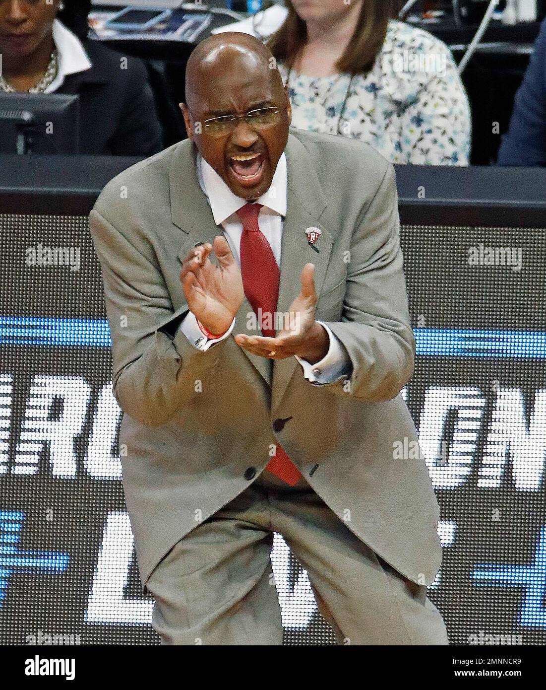 Radford head coach Mike Jones encourages his team during the first half ...