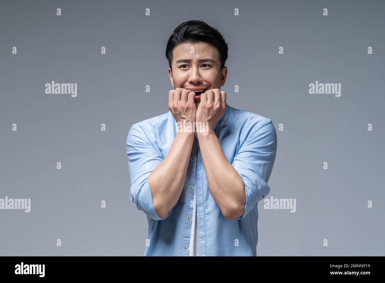 The young man in horror Stock Photo - Alamy