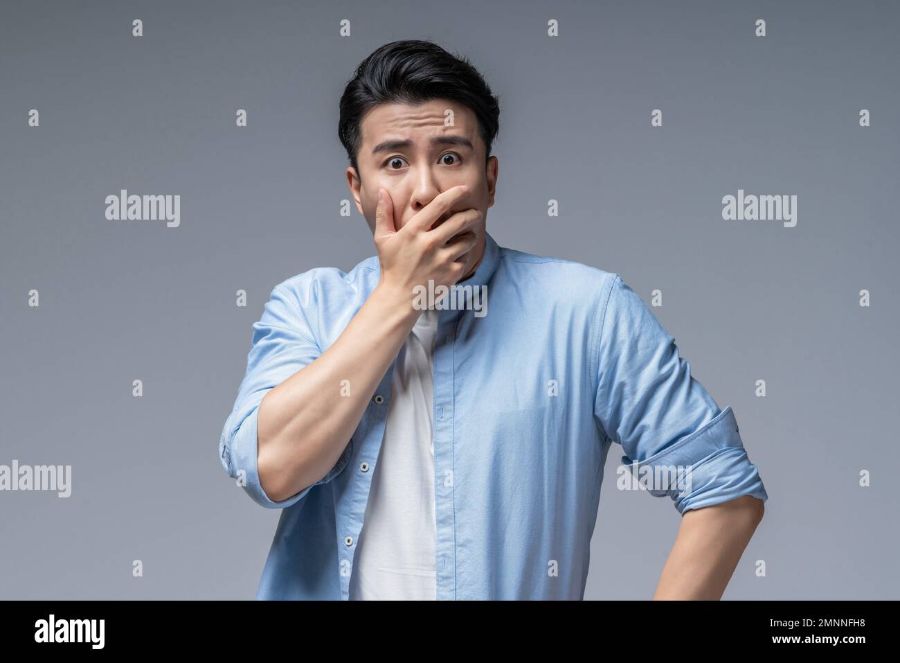 The young man in horror Stock Photo - Alamy