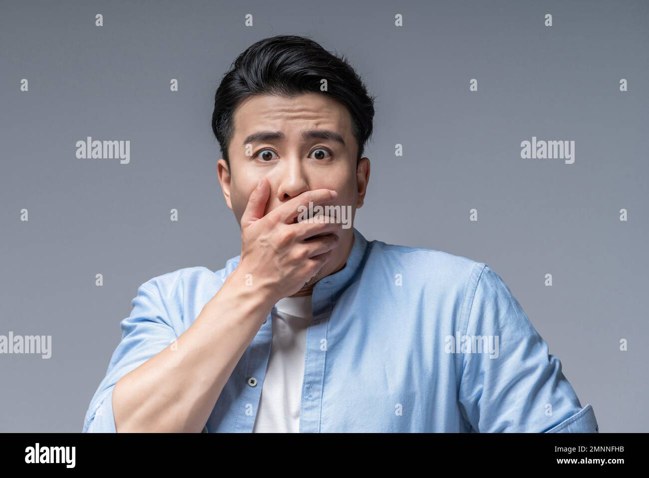 The young man in horror Stock Photo - Alamy