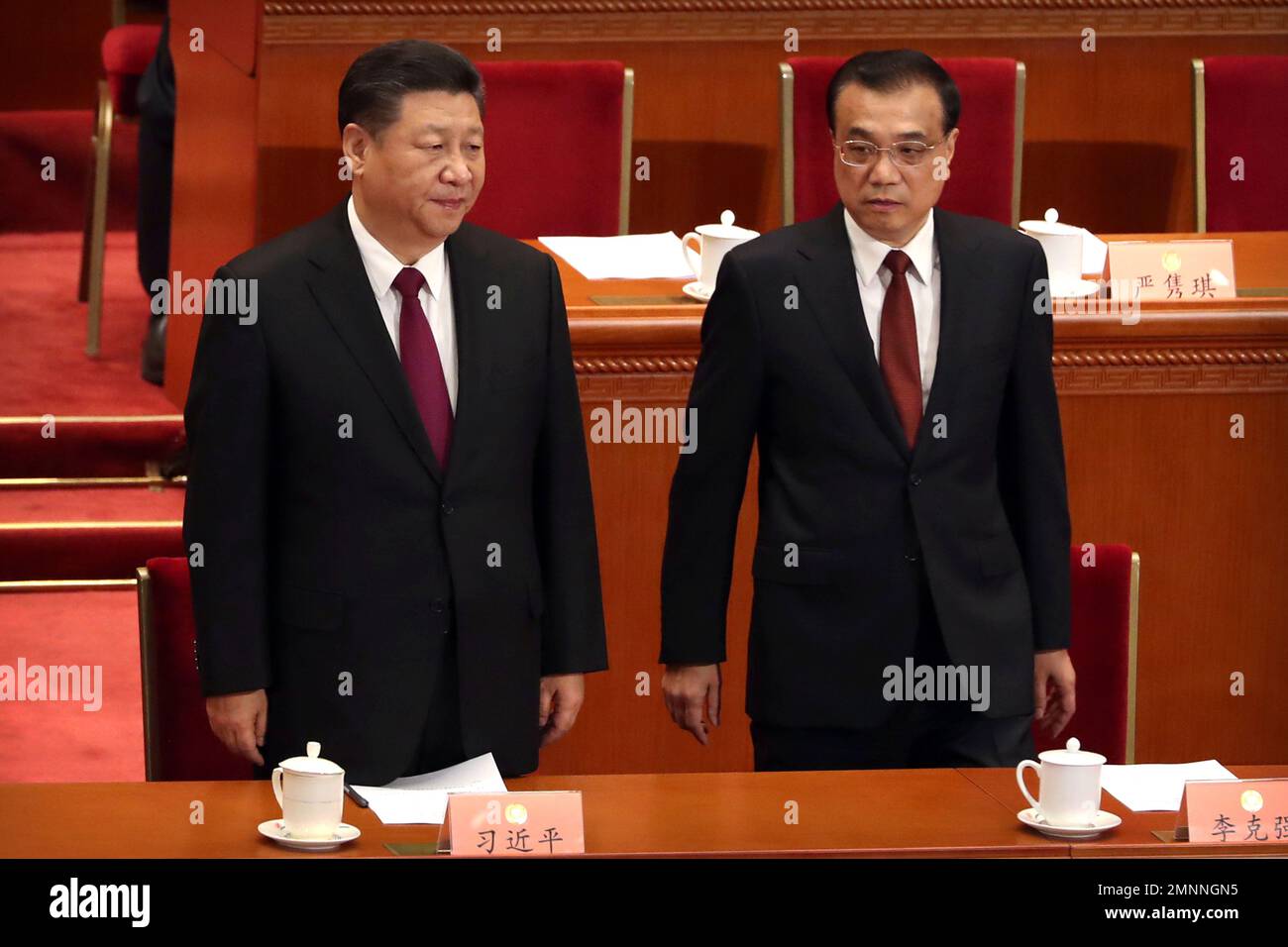 Chinese President Xi Jinping, left, and Premier Li Keqiang arrive for ...