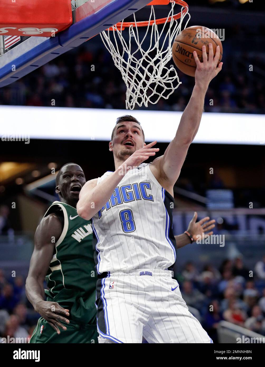 Orlando Magic's Mario Hezonja (8) makes a basket in front of Milwaukee ...