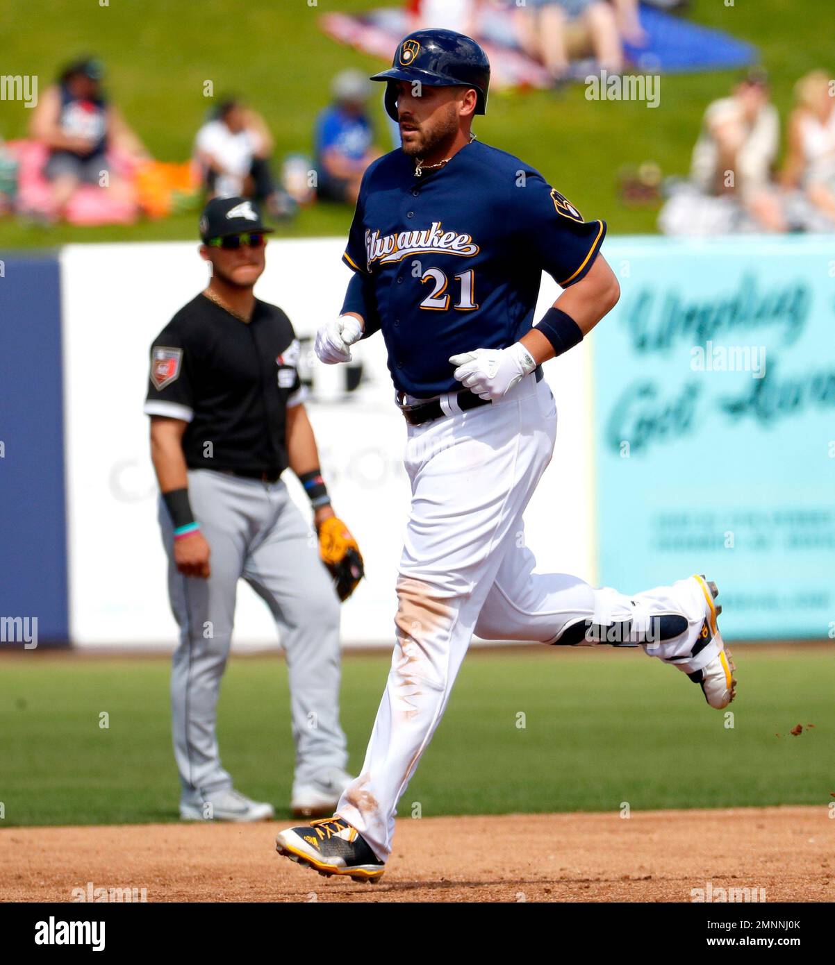 Milwaukee Brewers' Travis Shaw (21) rounds the bases after hitting a ...