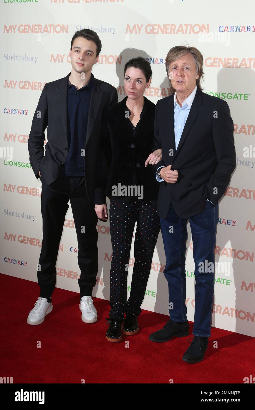 Arthur Donald, Mary McCartney and Sir Paul McCartney pose for ...