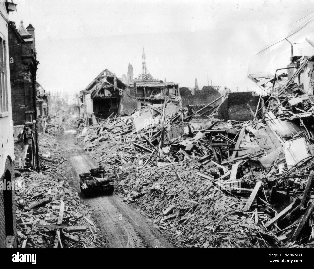 An Allied tank rumbles along the Adolf Hitlerstrasse, the longest ...
