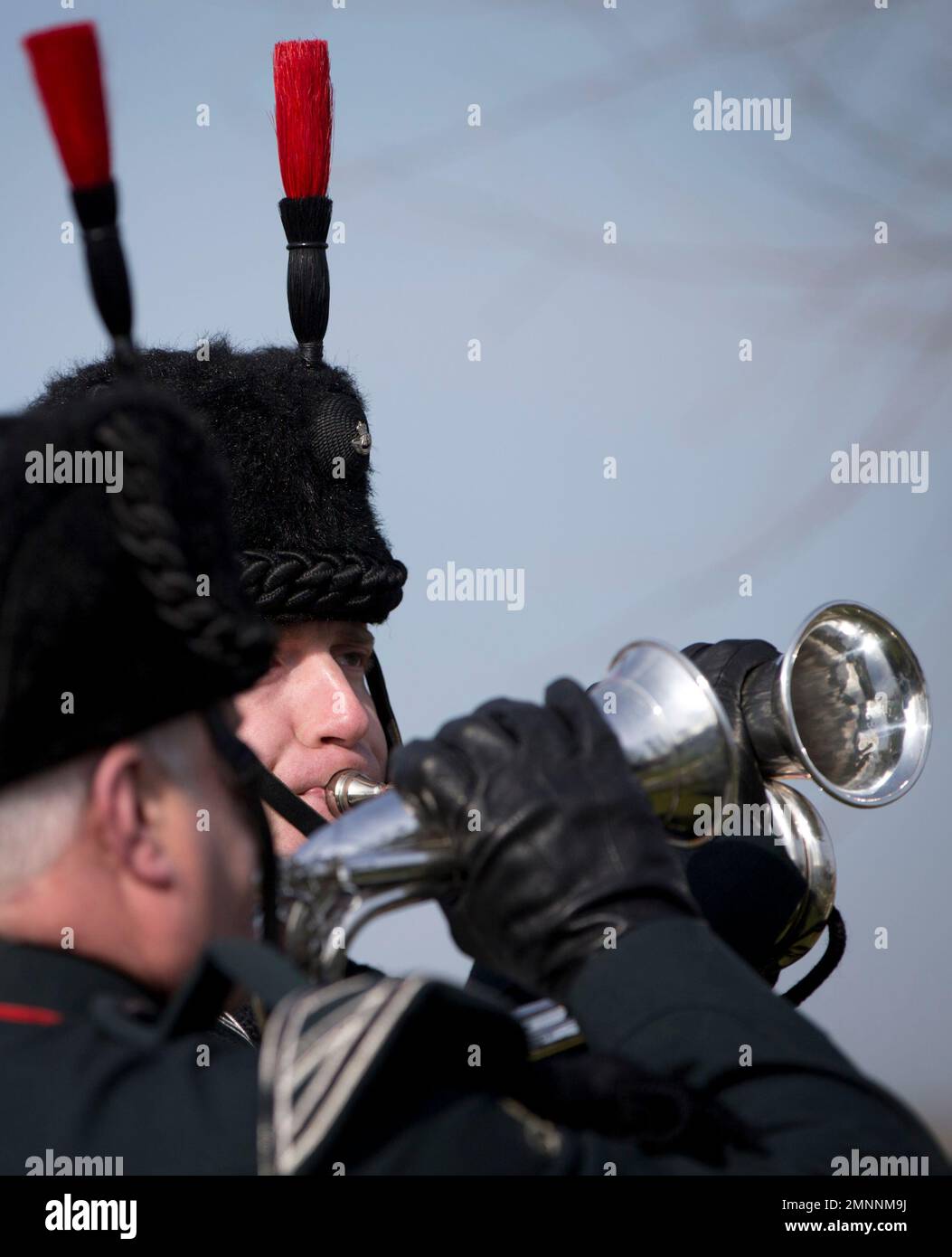 Soldiers from the Rifles Brigade play the Last Post during a reburial ...