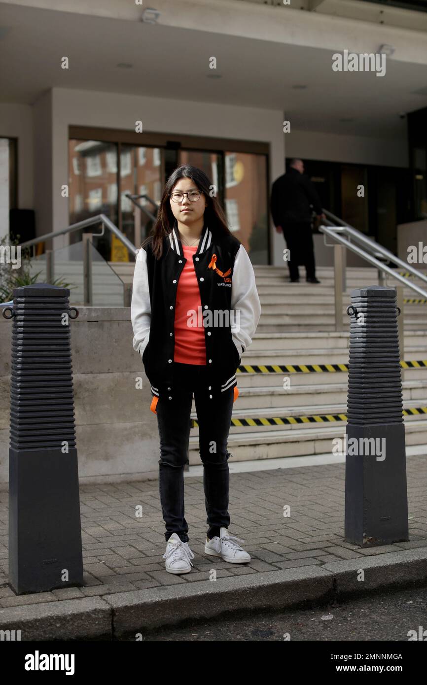 Izzy Harris, aged 17, from New York, poses for a portrait outside the ...