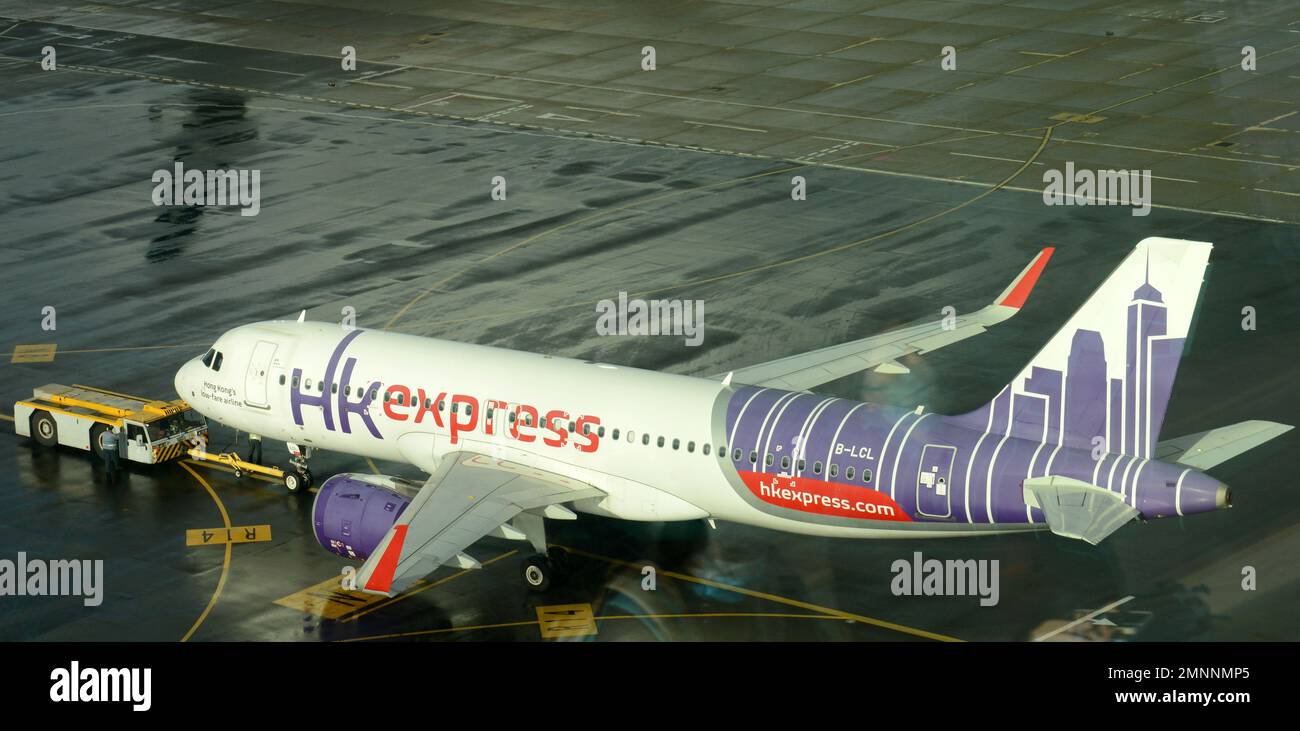 HK express airplane on the tarmac at HKIA, Hong Kong Stock Photo - Alamy