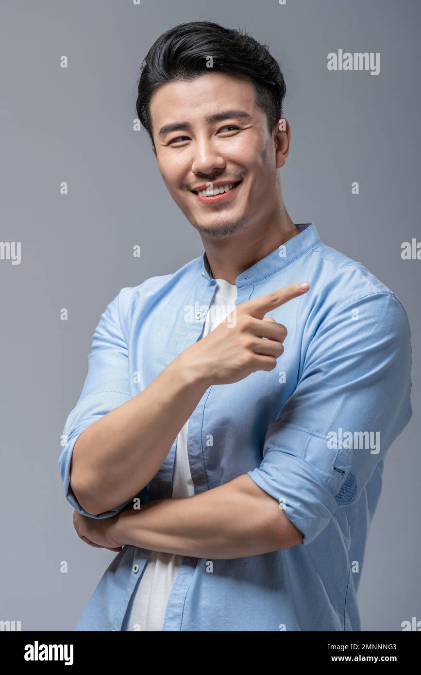 Take the young man Stock Photo - Alamy