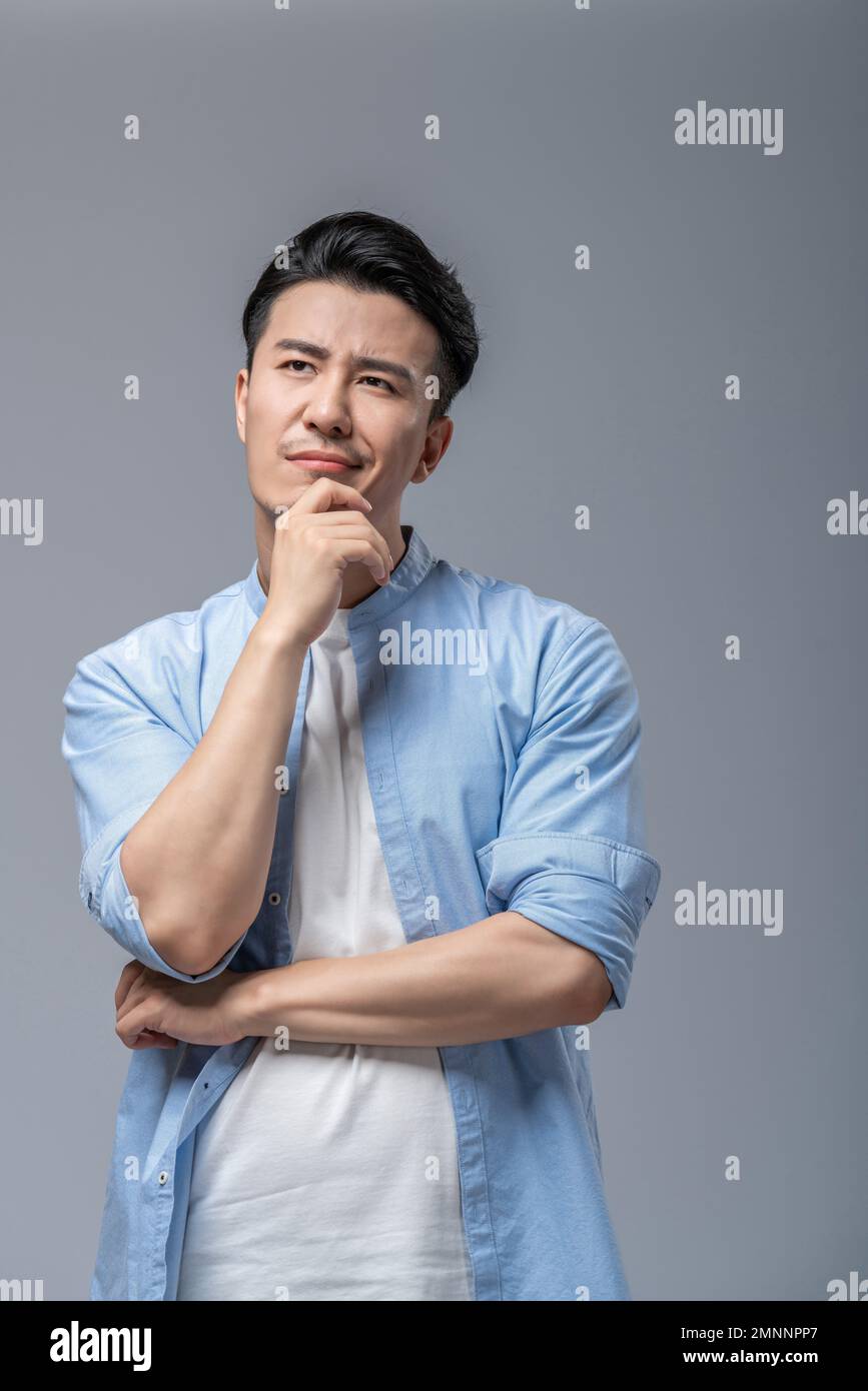 Take the young man Stock Photo - Alamy