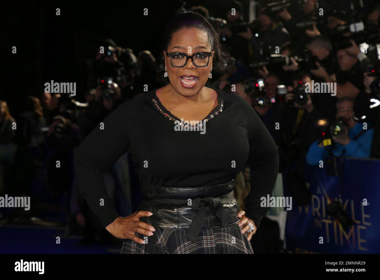 Actress Oprah Winfrey poses for photographers upon arrival at the ...