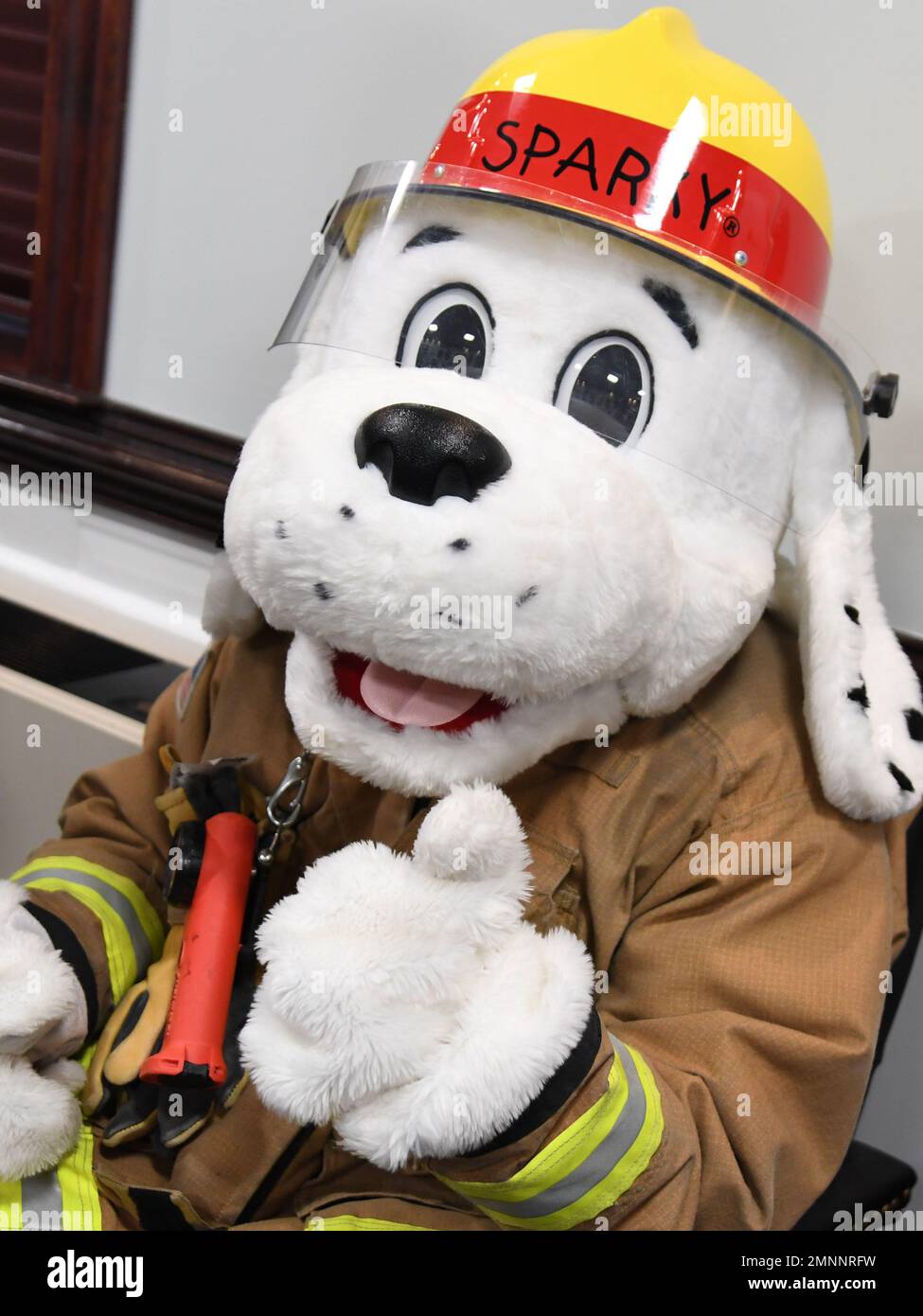 Sparky poses for a photo during the Fire Prevention Week proclamation ...
