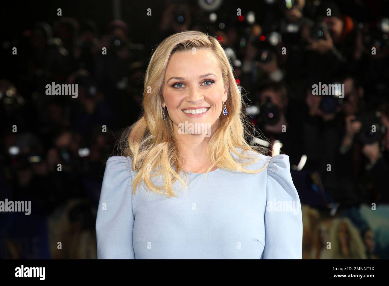 Actress Reese Witherspoon poses for photographers upon arrival at the ...