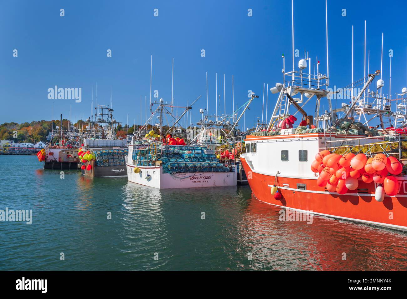 Fishing boats preparing for opening of the fishing season on the docks ...