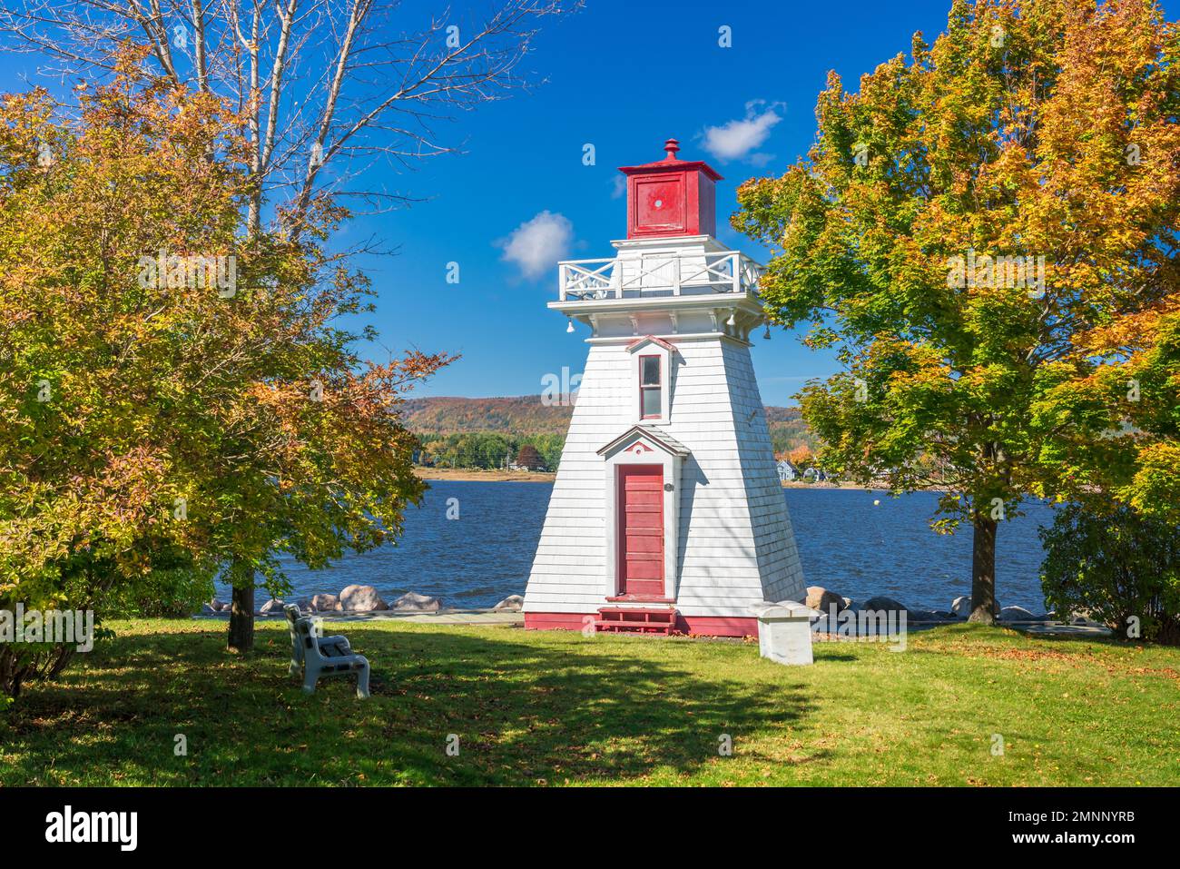 A lighhouse with fall foliage color in Annapolis Royal, Nova Scotia ...