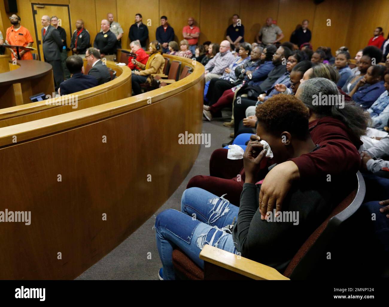 Family members console each other at the arraignment of Willie Cory ...