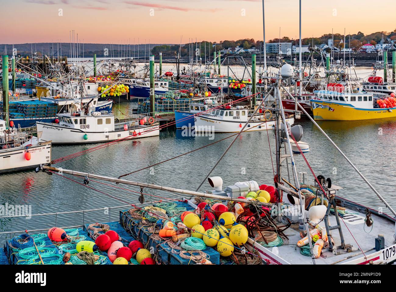 Fishing boats preparing for opening of the fishing season on the docks ...