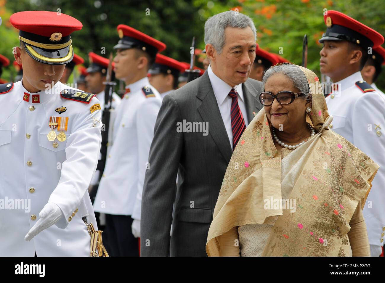 Bangladesh Prime Minister Sheikh Hasina, front right, is accompanied by Singapore's Prime ...