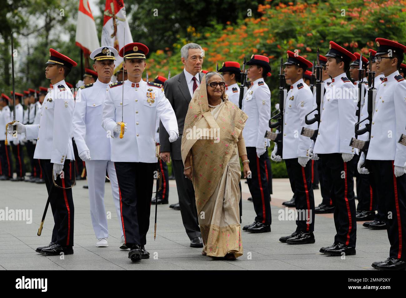 Bangladesh Prime Minister Sheikh Hasina, center front, is accompanied by Singapore's Prime ...