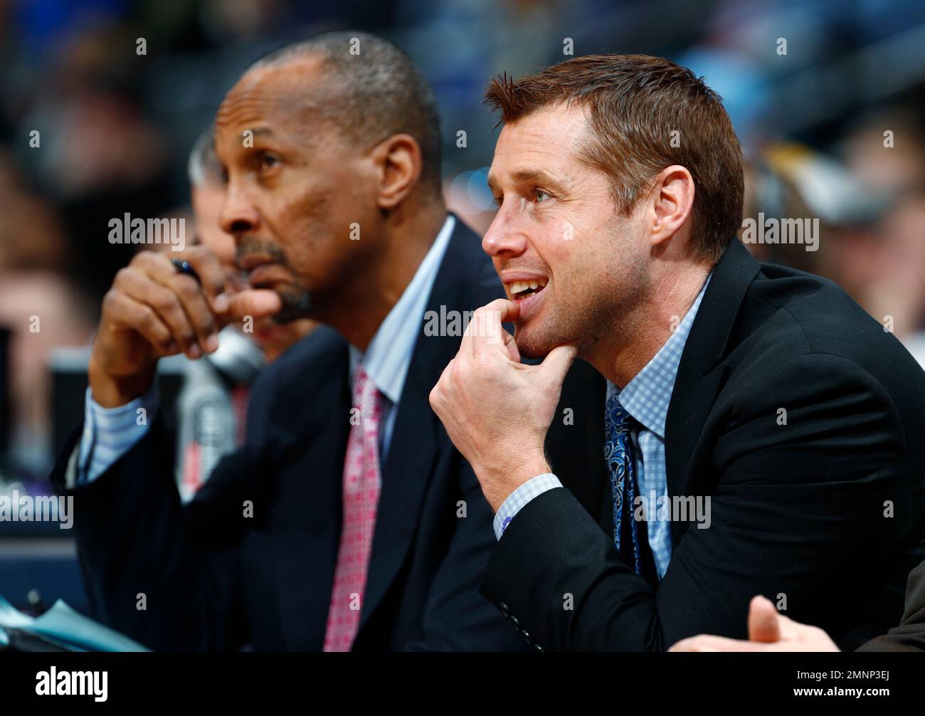 Sacramento Kings head coach David Joerger, front, looks on with ...
