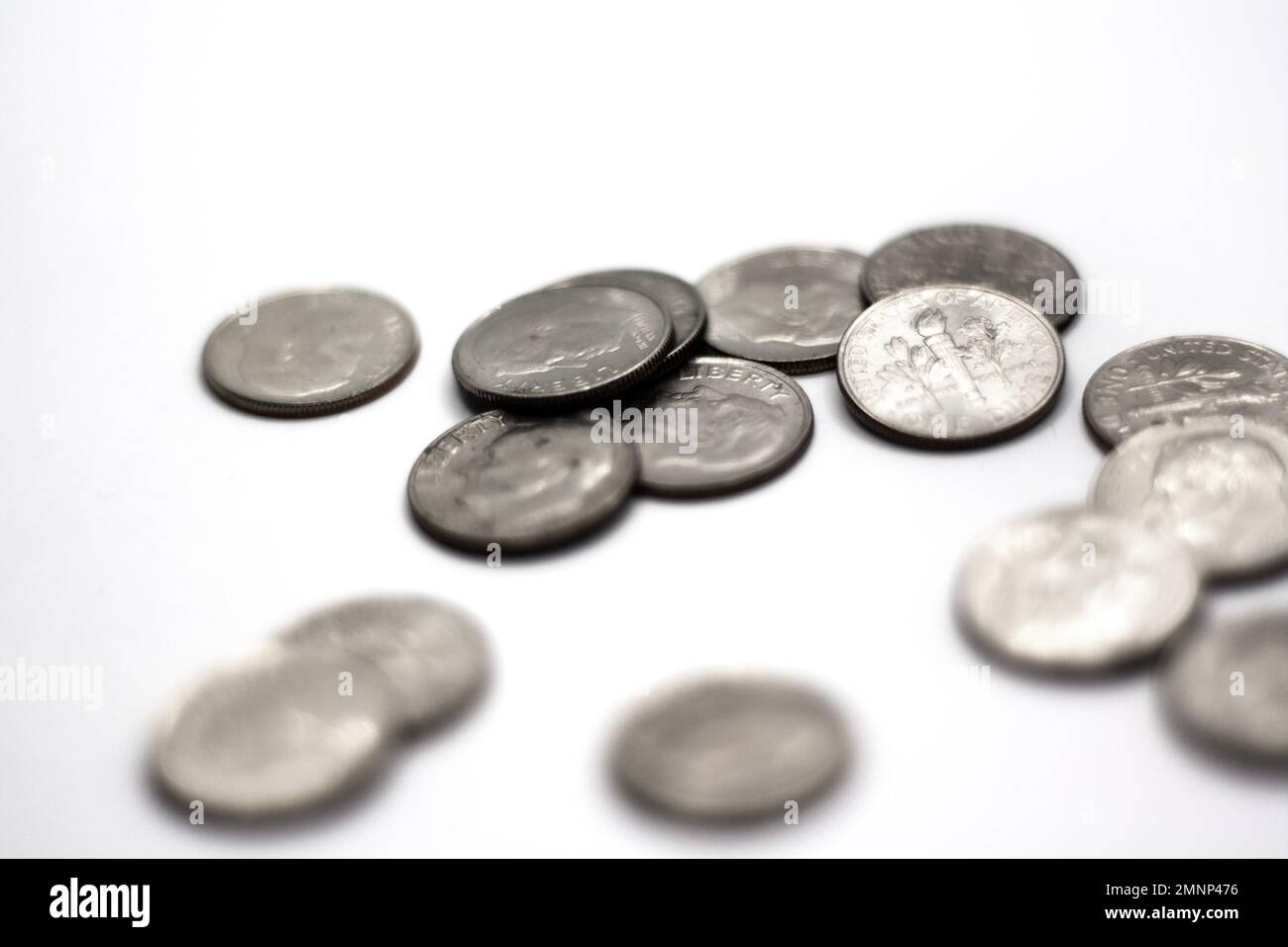 Dimes, American ten cent coins, macro Stock Photo - Alamy