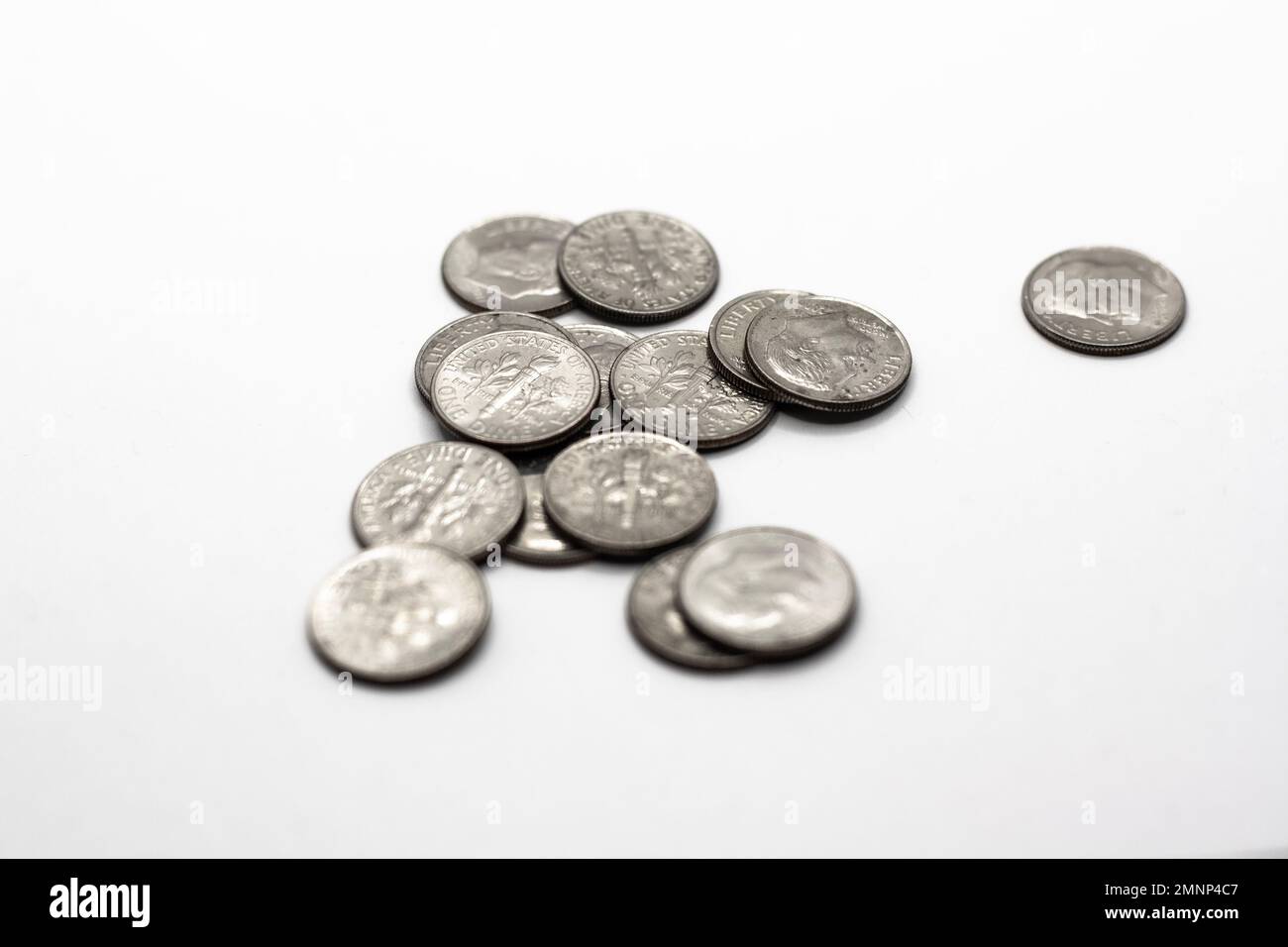 Dimes, American ten cent coins, macro Stock Photo - Alamy