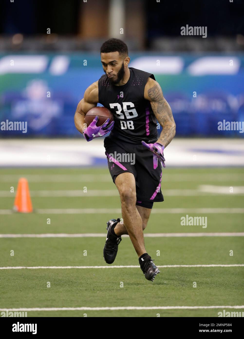 Oklahoma defensive back J T Thomas runs a drill during the NFL football ...