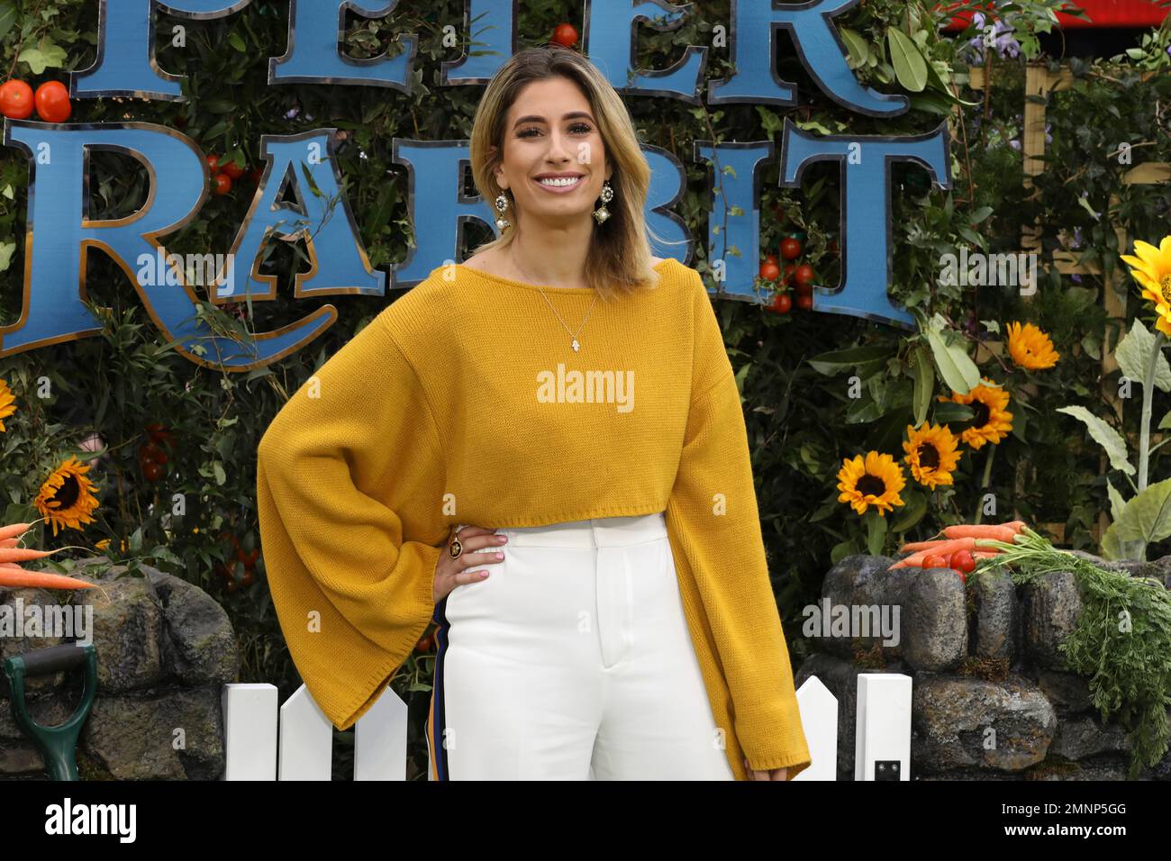Singer Stacey Solomon poses for photographers on arrival at the ...