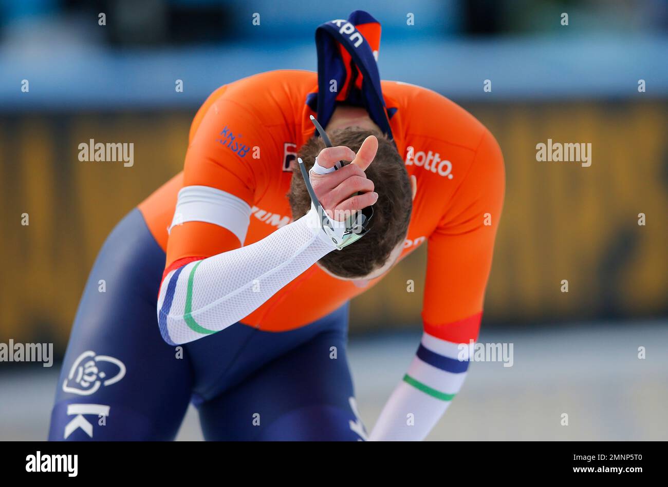 Sven Kramer of The Netherlands takes off his hood after his men's 1,500 ...