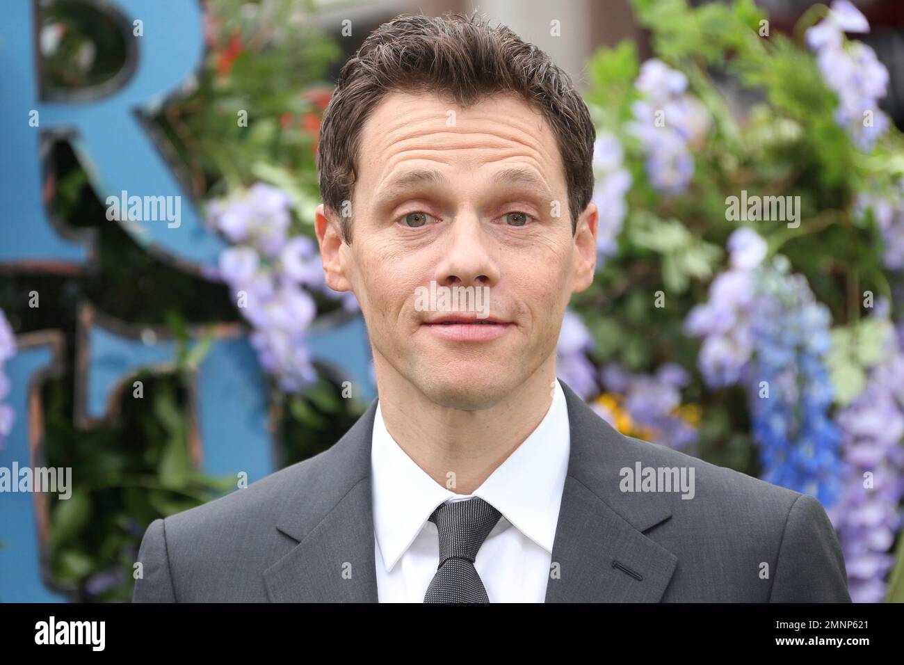 Director Will Gluck poses for photographers upon arrival at the UK Gala ...