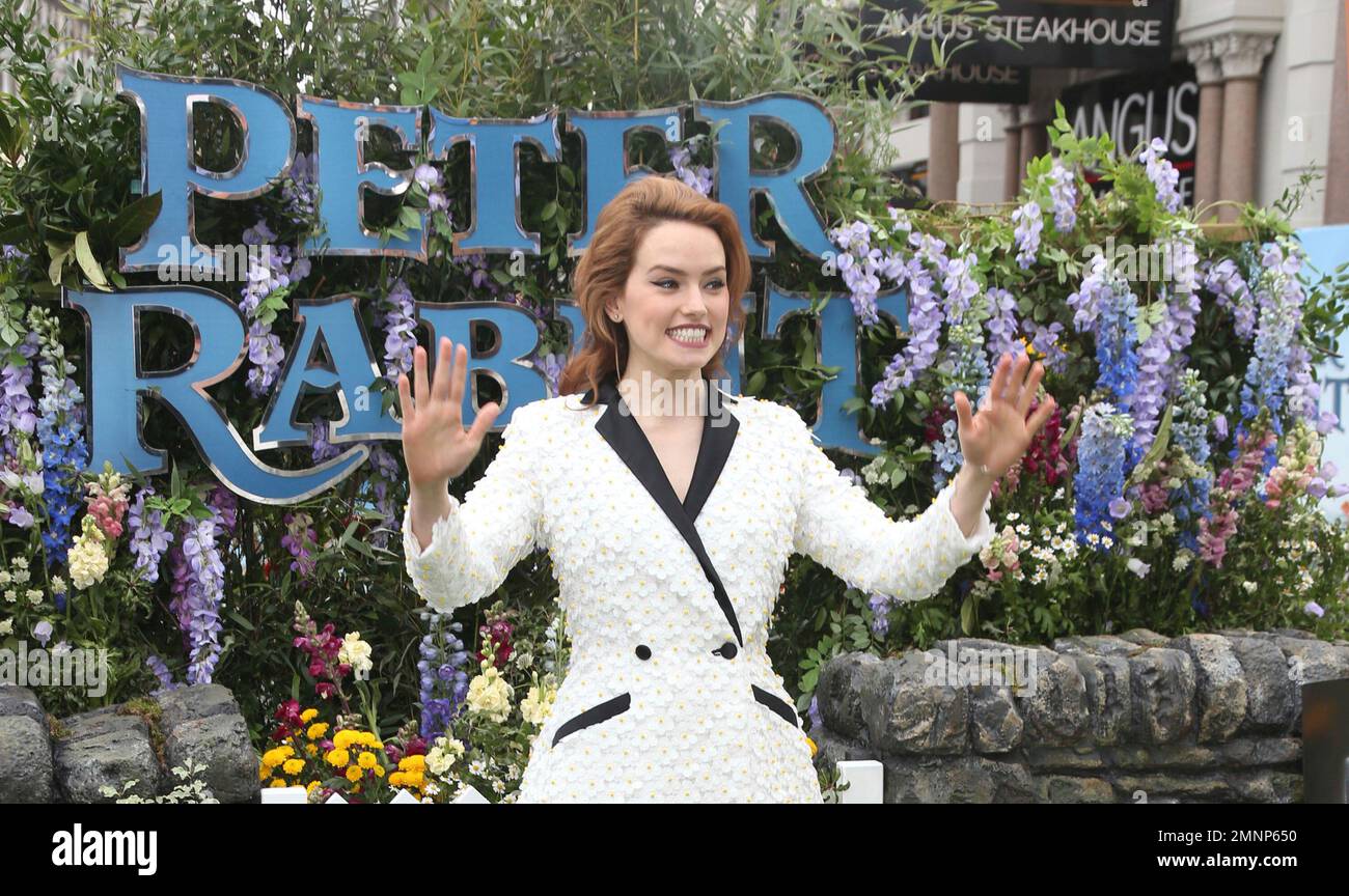 Actress Daisy Ridley poses for photographers upon arrival at the UK ...