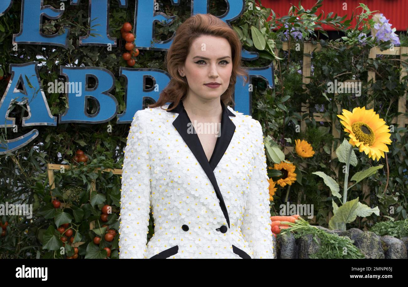 Actress Daisy Ridley poses for photographers on arrival at the premiere ...