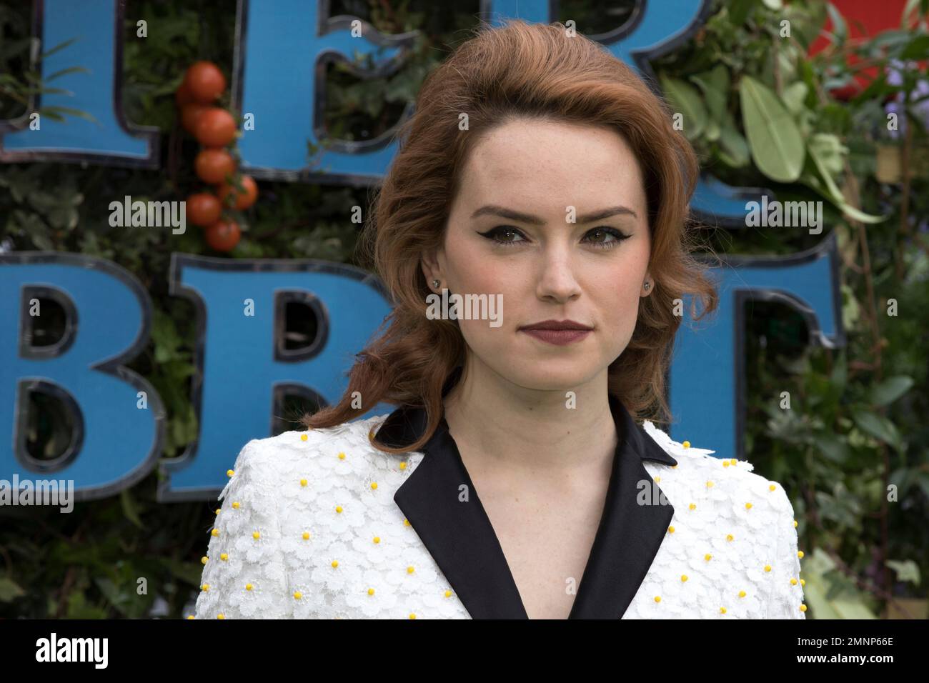 Actress Daisy Ridley poses for photographers on arrival at the premiere ...