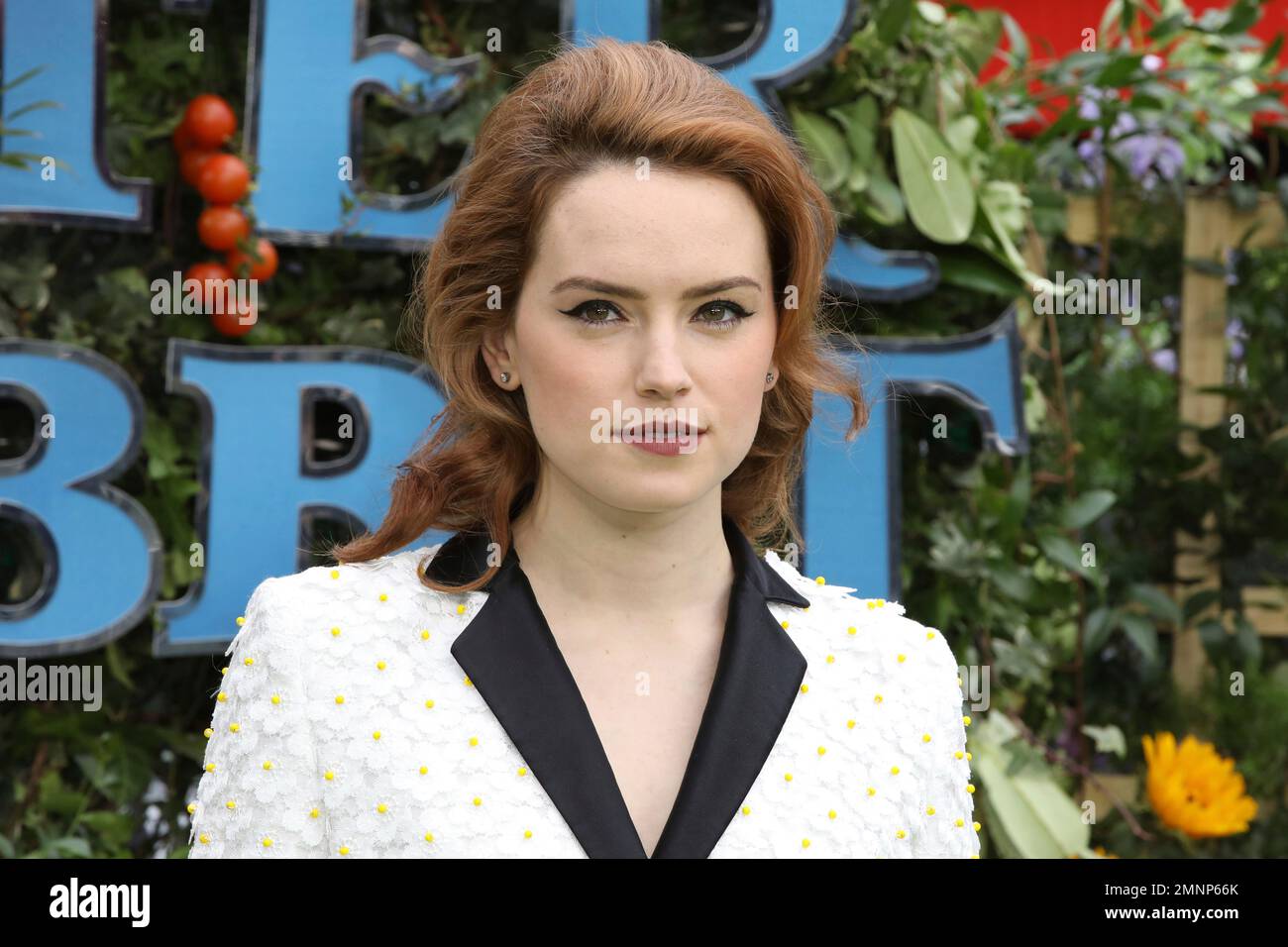 Actress Daisy Ridley poses for photographers on arrival at the premiere ...