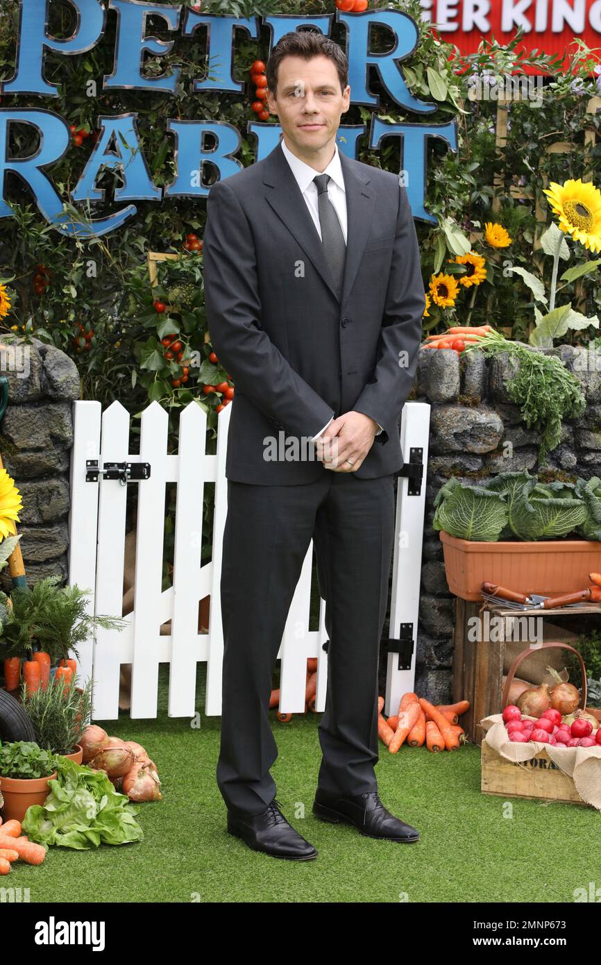 Film Director Will Gluck poses for photographers on arrival at the ...