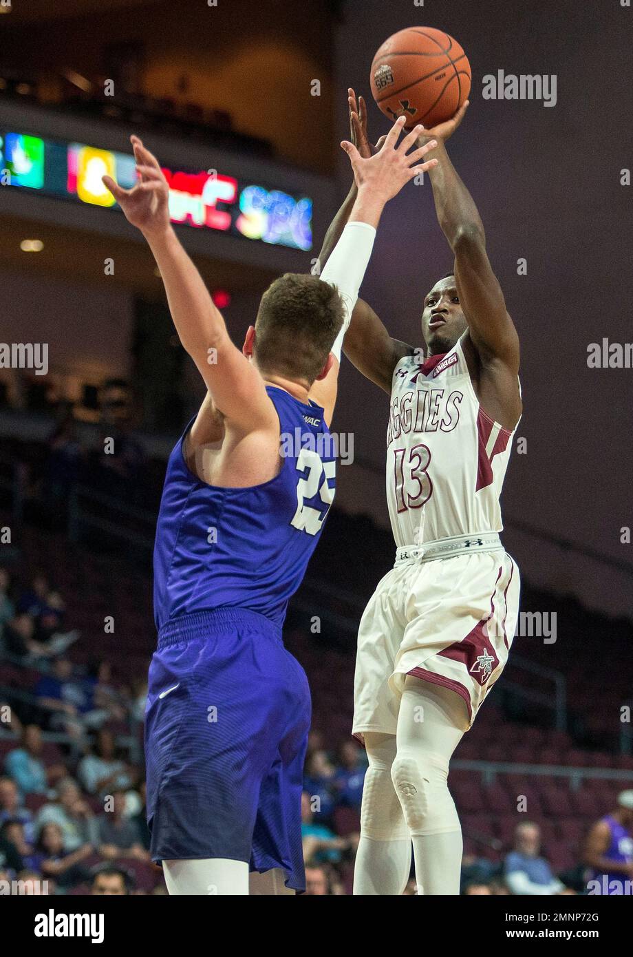 New Mexico State guard Sidy N'Dir (13) shoots over Grand Canyon center ...