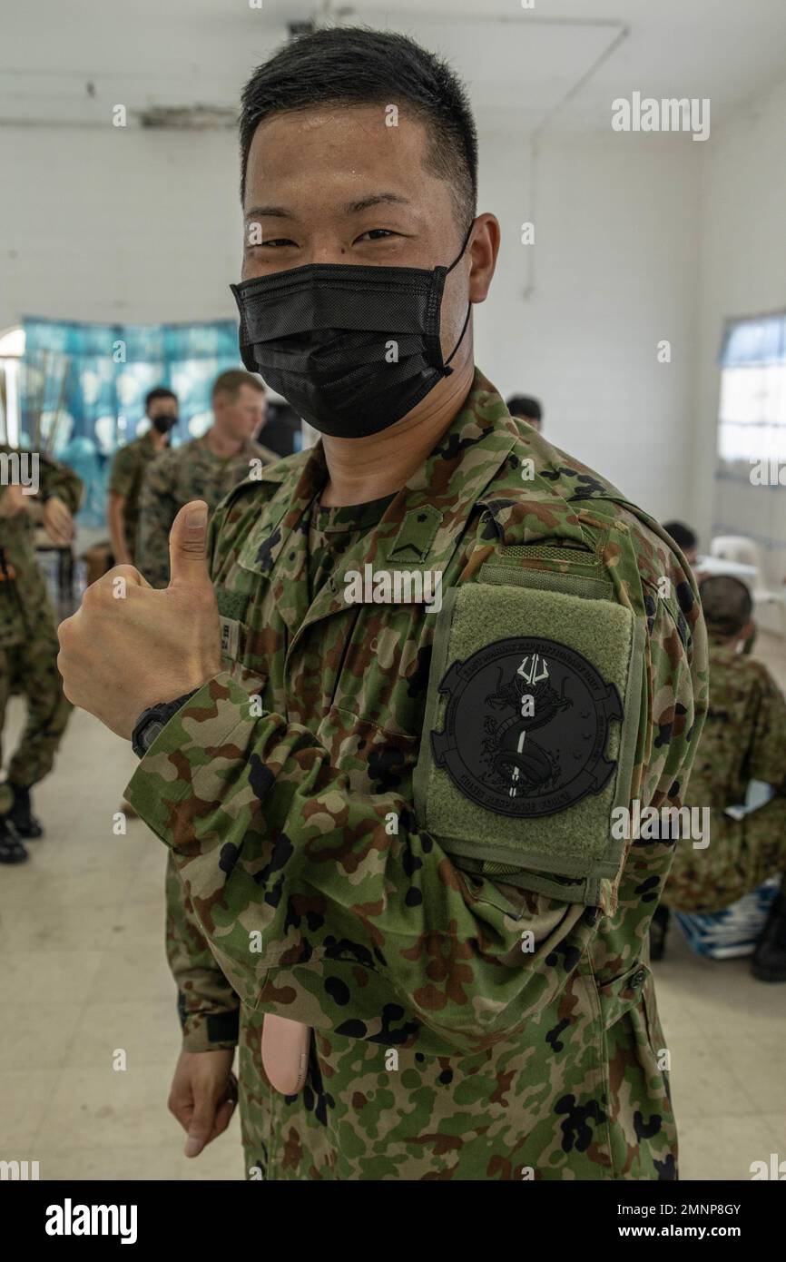 Japan Ground Self-Defense Force Sgt. Takuya Ikeda poses for a photo at Naval Education, Training ...