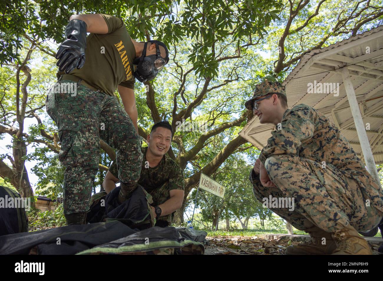 Philippine Marine Corps Pfc. Herrol B. Sabando, left, Japan Ground Self-Defense Force Sgt ...