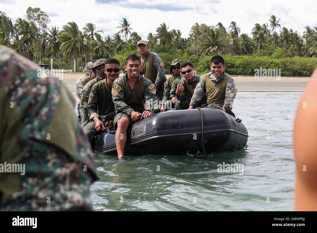 Philippine Marine Corps scout snipers and force reconnaissance Marines conduct small boat ...