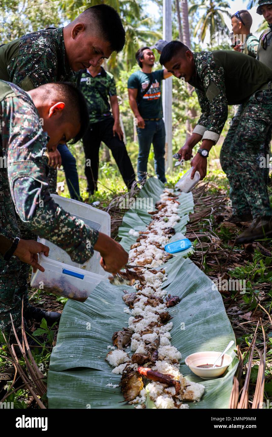 Philippine Marine Corps scout snipers and force reconnaissance Marines debrief after ...