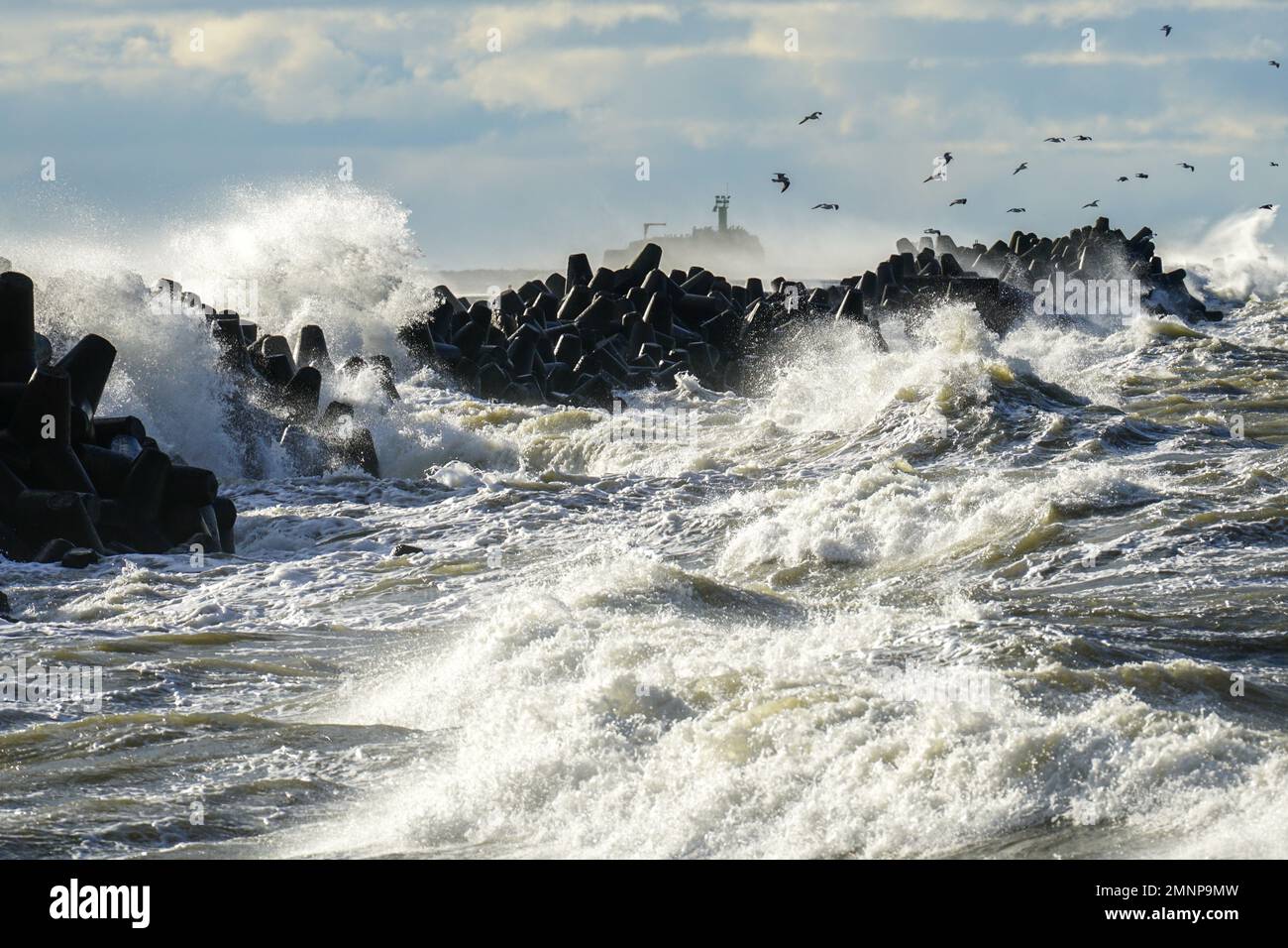 Coastal storm in the Baltic Sea, big waves crash against the concrete ...