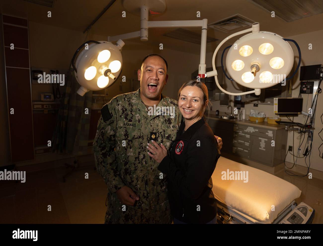 Lt. Cmdr. Nathan Aranas, left, from Charleston, South Carolina, a Navy ...