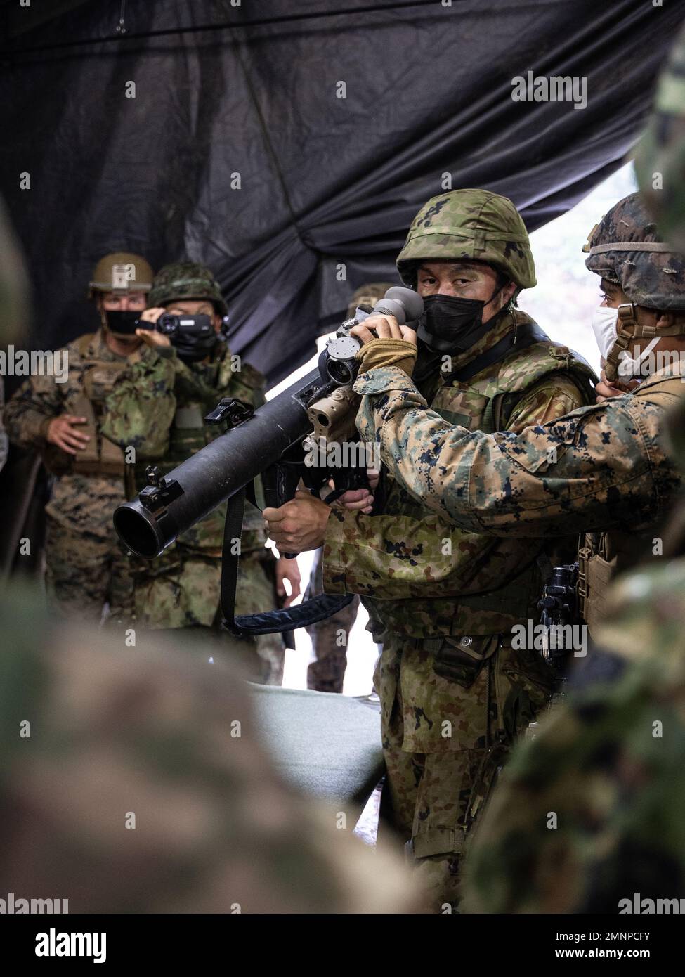 A soldier with the Japan Ground Self-Defense Force handles a Shoulder ...