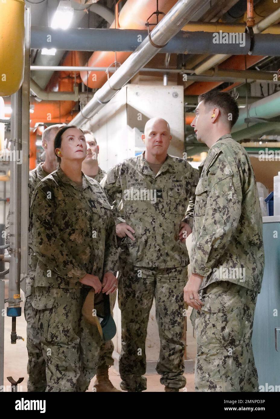 Rear Adm. Nancy Lacore, commandant, Naval District Washington (left ...