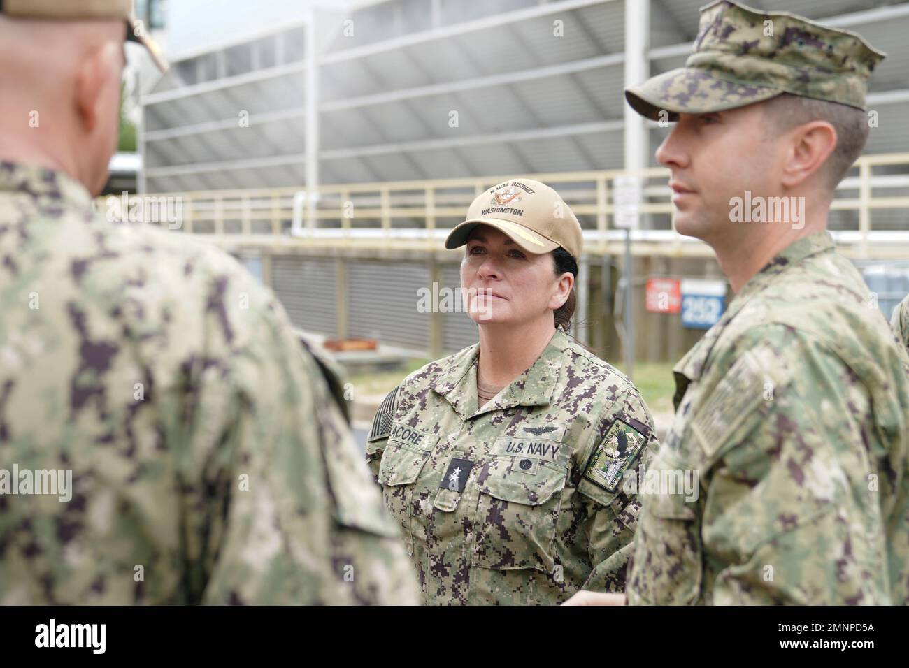 Rear Adm. Nancy Lacore, commandant, Naval District Washington (center ...