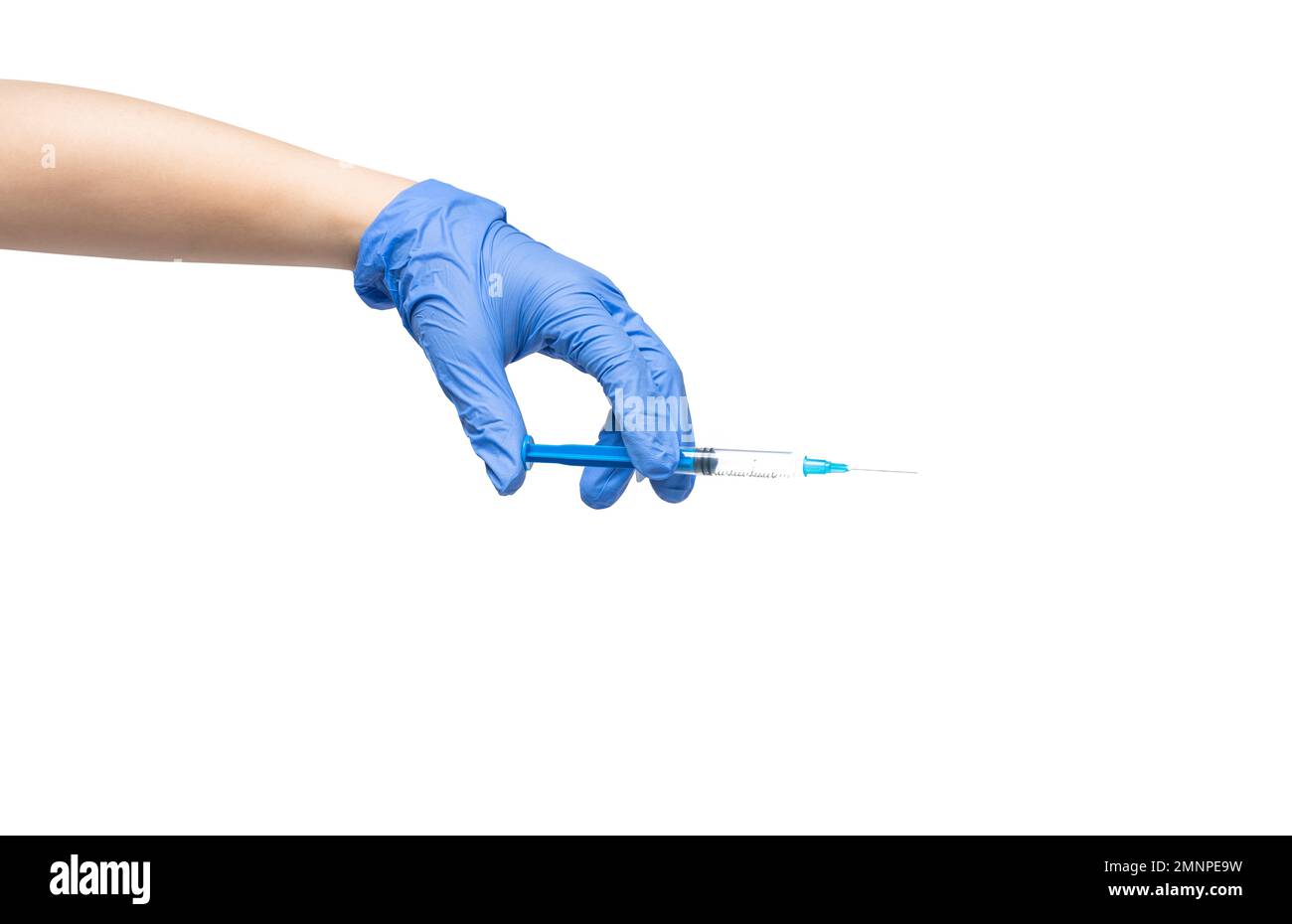 Hand holding a syringe Stock Photo - Alamy