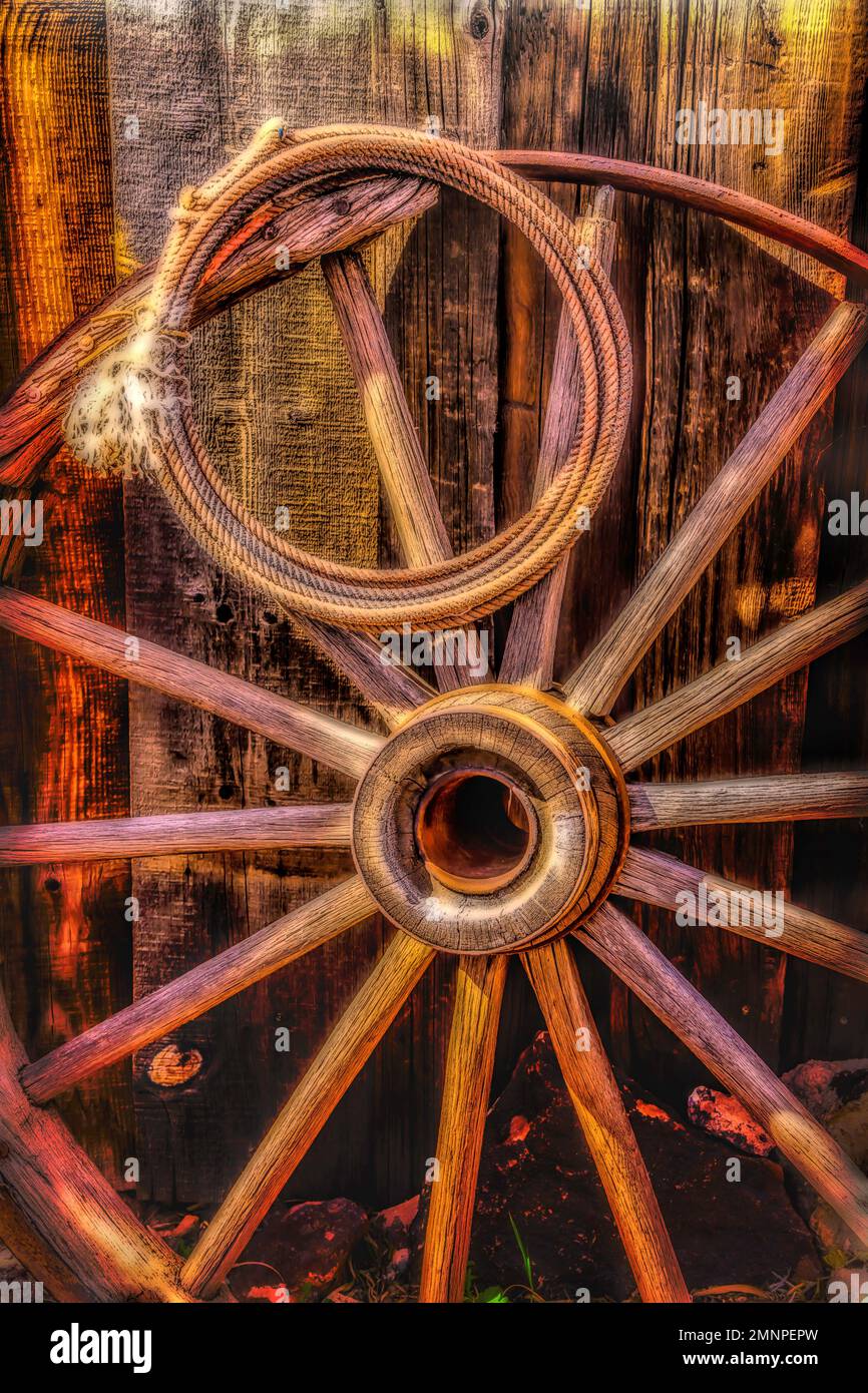 Old Wheel And Rope Stock Photo - Alamy