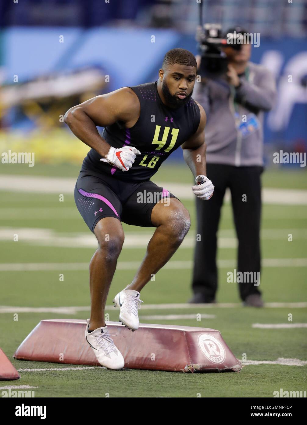 Ohio State linebacker Chris Worley runs a drill during the NFL football ...