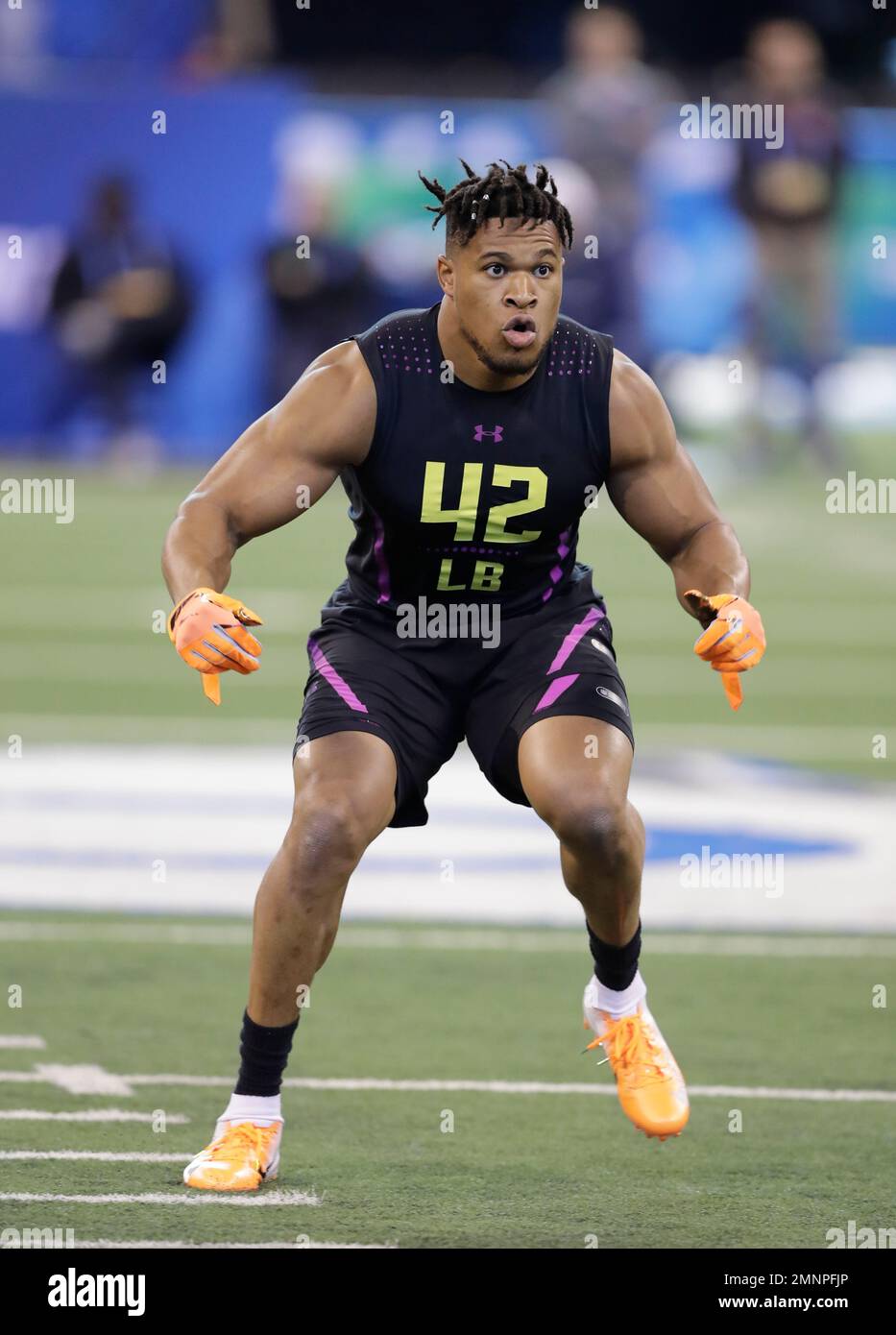UCLA linebacker Kenny Young runs a drill during the NFL football ...