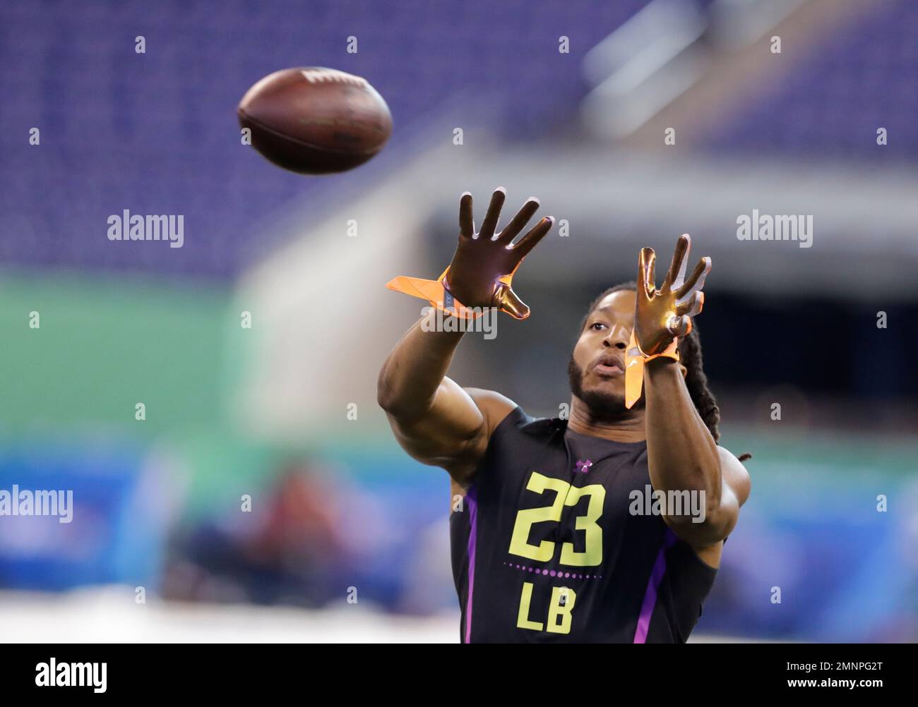 Stanford linebacker Peter Kalambayi runs a drill during the NFL ...